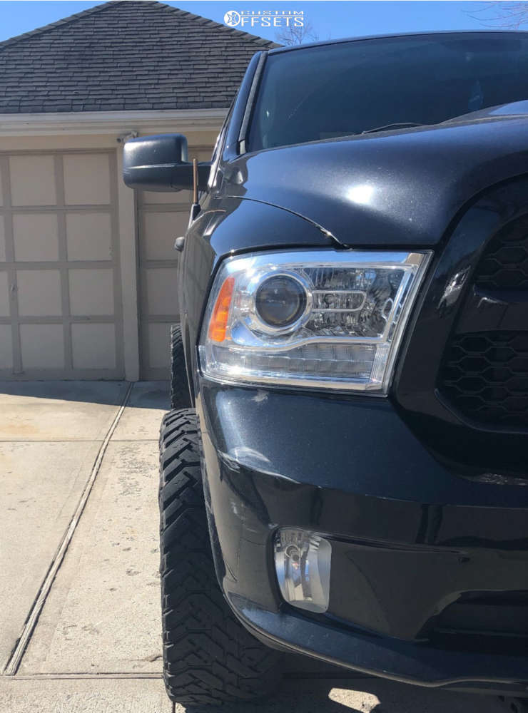 2015 Ram 1500 with 20x9 18 OEM Wheels Spaced Out Stockers and 33/12 ...
