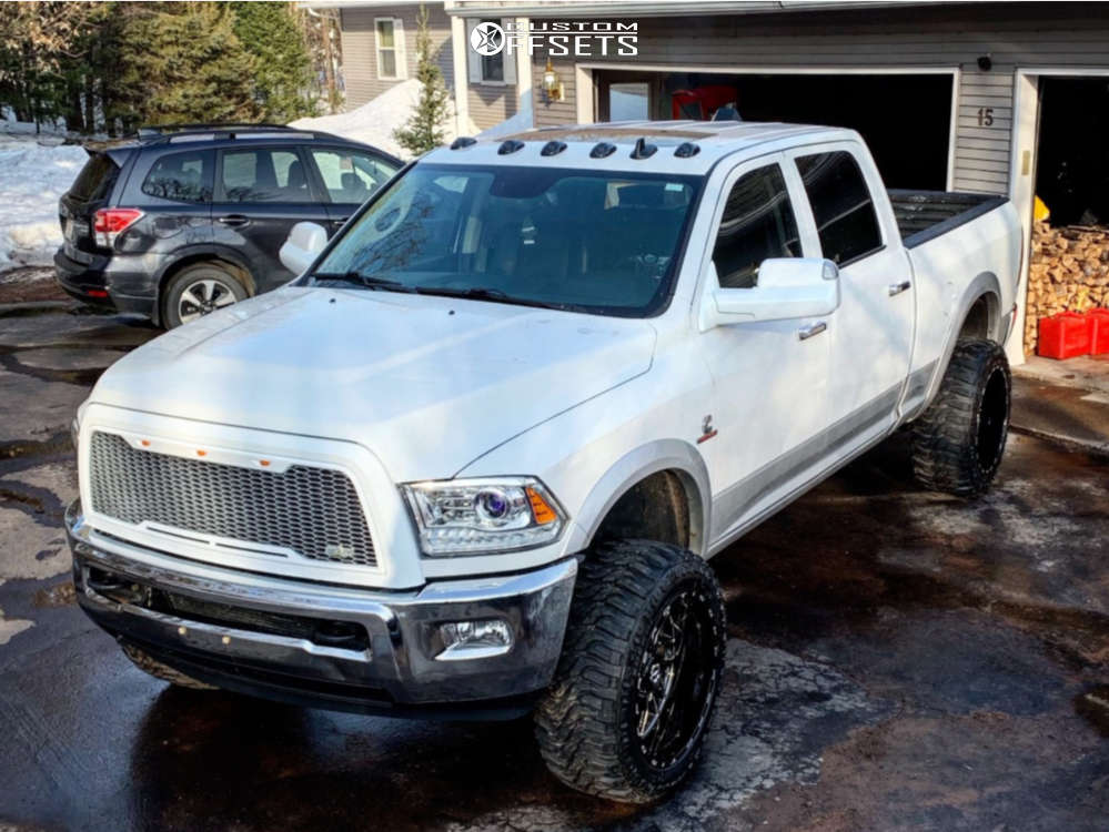 2014 Ram 2500 with 22x12 -44 TIS 544BM and 35/12.5R22 Federal Xplora M ...