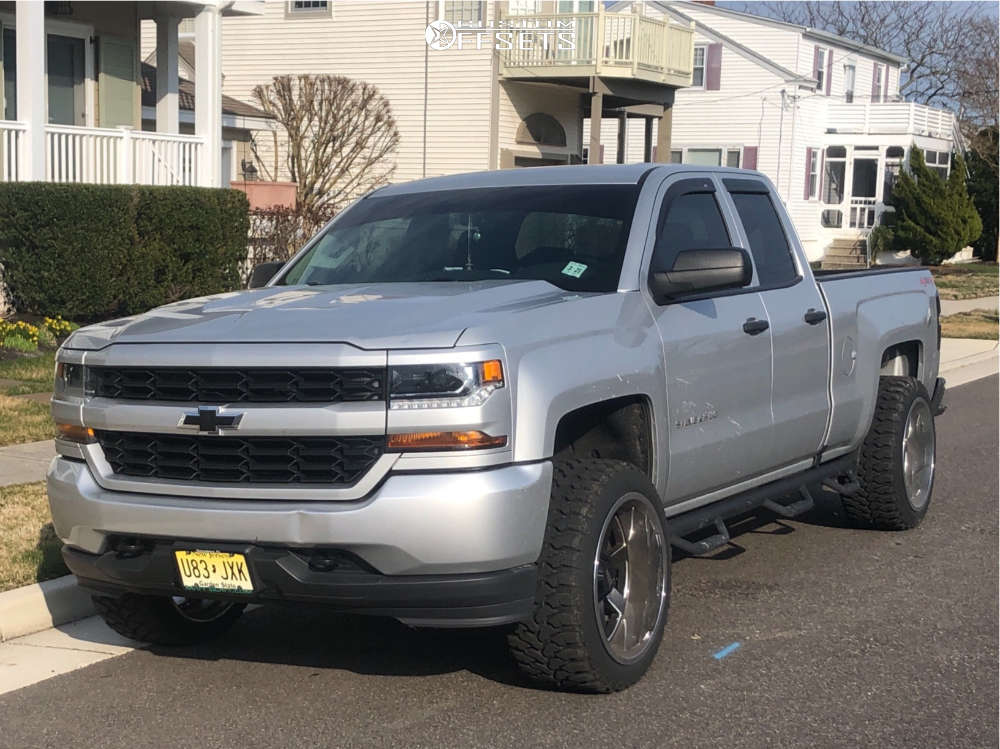 2016 Chevrolet Silverado 1500 with 22x12 -44 Moto Metal Mo200 and 33/12 ...