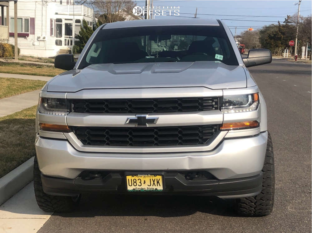 2016 Chevrolet Silverado 1500 with 22x12 -44 Moto Metal Mo200 and 33/12 ...