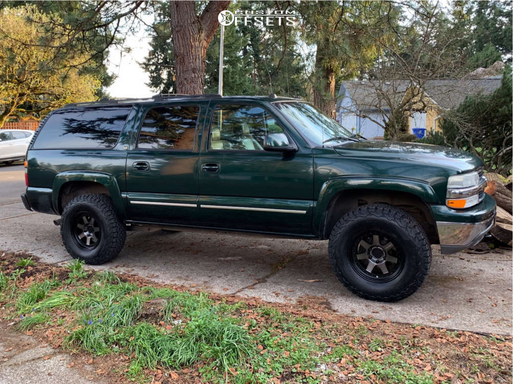 2004 Chevrolet Suburban with 17x9 -6 Mayhem Prodigy and 285/75R17 ...