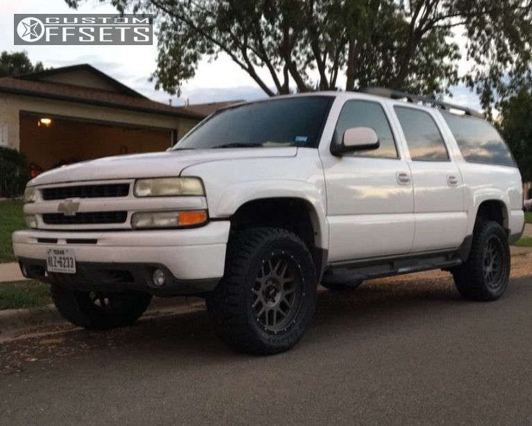 2004 Chevrolet Tahoe with 20x9 -12 Pro Comp Series 40 and 33/12.5R20 ...