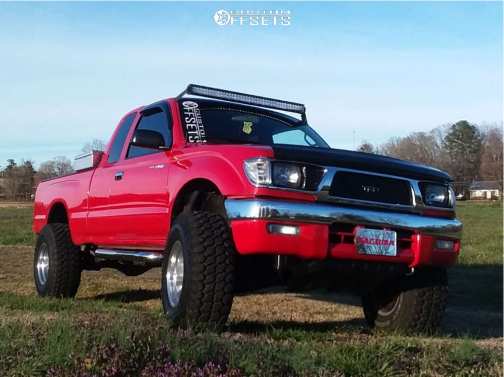 1995 Toyota Tacoma with 15x10 -47 Pro Comp Series 69 and 32/11.5R15 ...