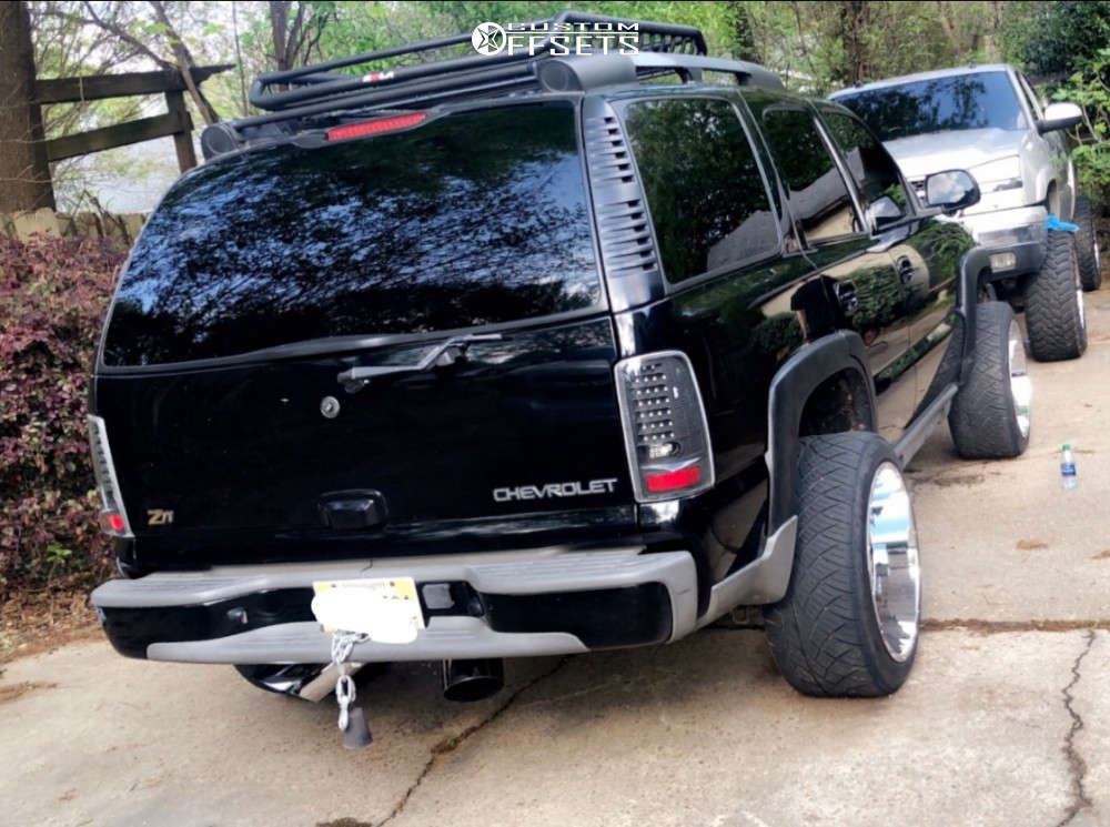 2002 Chevrolet Tahoe with 22x12 -44 Xtreme Force Xf4 and 305/50R22 ...
