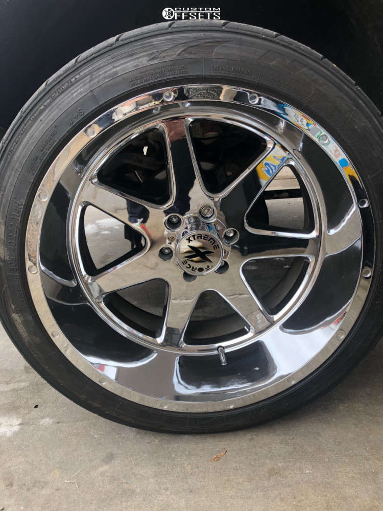 2002 Chevrolet Tahoe with 22x12 -44 Xtreme Force Xf4 and 305/50R22 ...