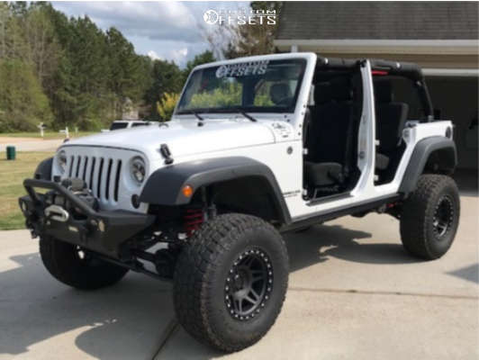 2014 Jeep Wrangler JK with 17x9 -12 Method Mr312 and 35/12.5R17 Toyo ...