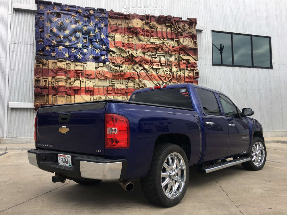 2010 Chevrolet Silverado 1500 with 22x9.5 18 XD Badlands and 305/45R22 ...