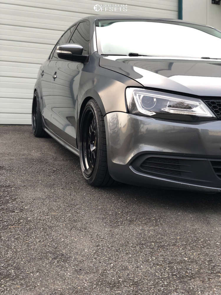 2011 Volkswagen Jetta with 17x8.5 30 ESR Sr01 and 225/45R17 Rapid P609 ...