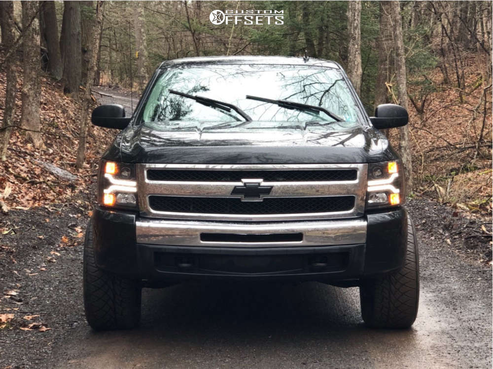 2009 Chevrolet Silverado 1500 with 20x12 -44 Moto Metal 962 and 305 ...