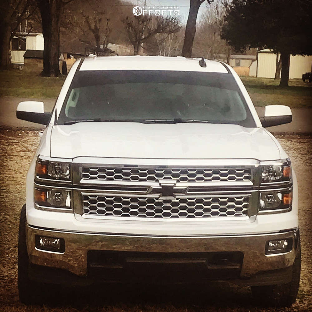 2015 Chevrolet C1500 with 20x10 -24 Dropstars 654mb and 275/55R20 Nitto ...