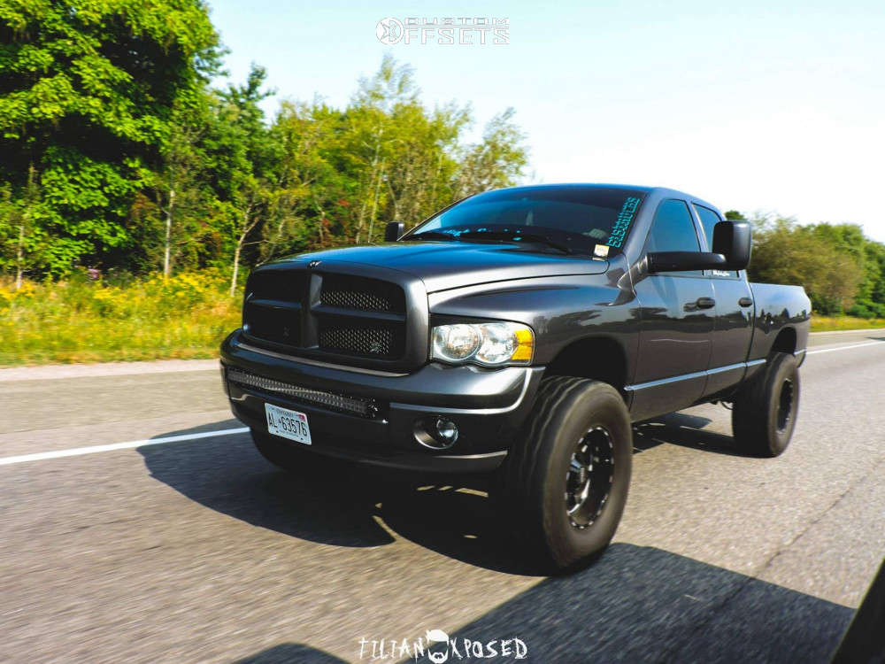 2002 Dodge Ram 1500 with 18x10 -24 Moto Metal Mo962 and 355/65R18 Nitto ...