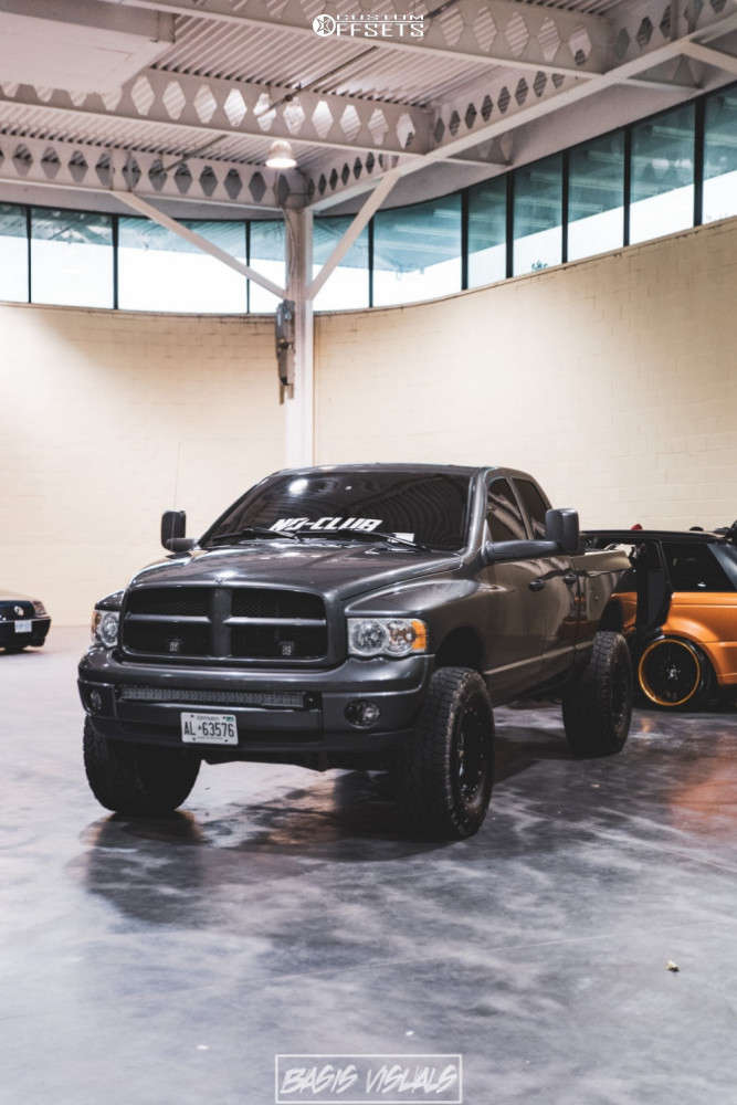 2002 Dodge Ram 1500 with 18x10 -24 Moto Metal Mo962 and 355/65R18 Nitto ...