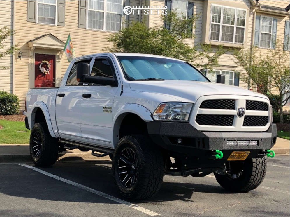 2014 Ram 1500 with 20x10 -24 Moto Metal Razor and 325/60R20 Toyo Tires ...