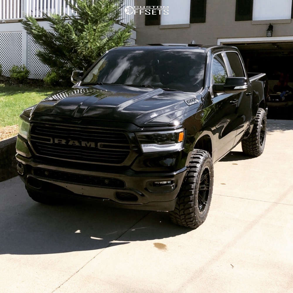 2019 Ram 1500 with 20x10 -24 Helo He900 and 35/12.5R20 Crosswind Mt and ...