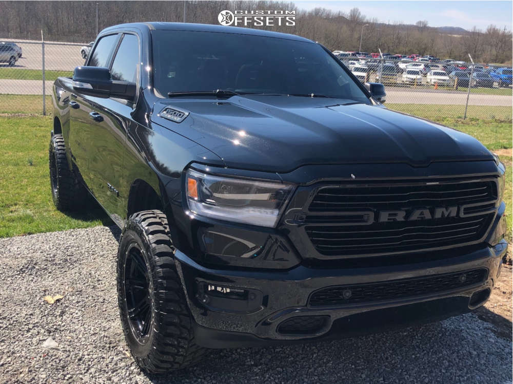 2019 Ram 1500 with 20x10 -24 Helo He900 and 35/12.5R20 Crosswind Mt and ...