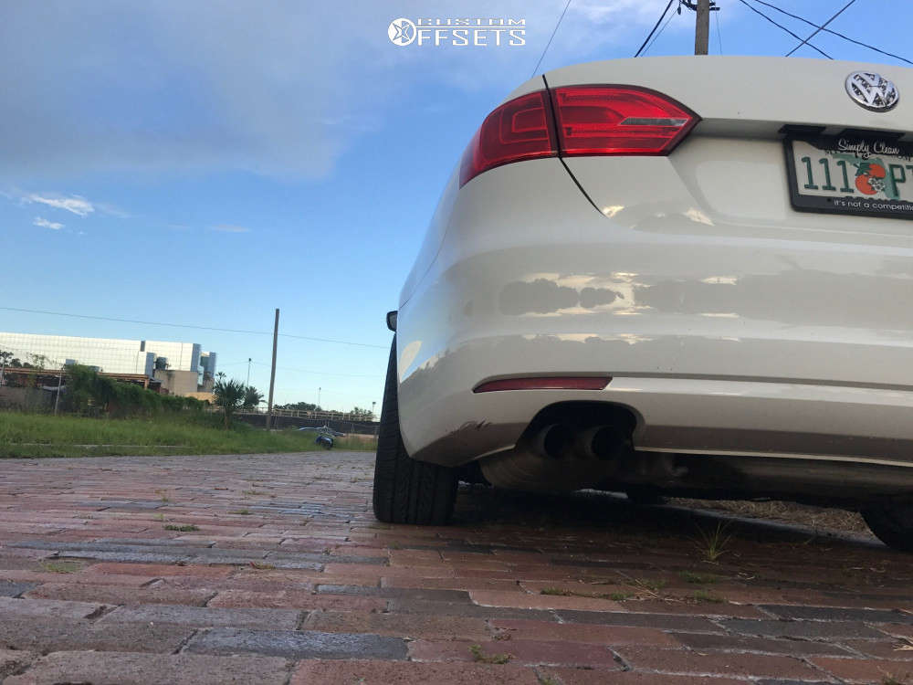2014 Volkswagen Jetta with 18x8 35 Alzor 628 and 225/40R18 Bridgestone ...