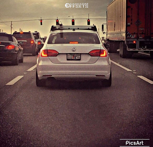2014 Volkswagen Jetta with 18x8 35 Alzor 628 and 225/40R18 Bridgestone ...