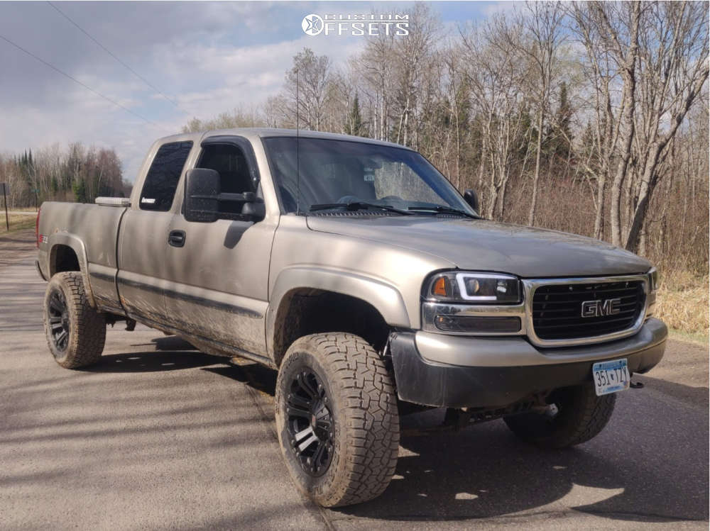 2002 GMC Sierra 1500 with 20x10 -12 XD XD778 and 35/12.5R20 Suretrac ...