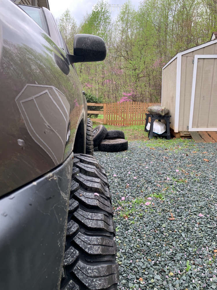 2011 Toyota Tacoma with 15x8 -18 Pro Comp Series 69 and 33/12.5R15 ...