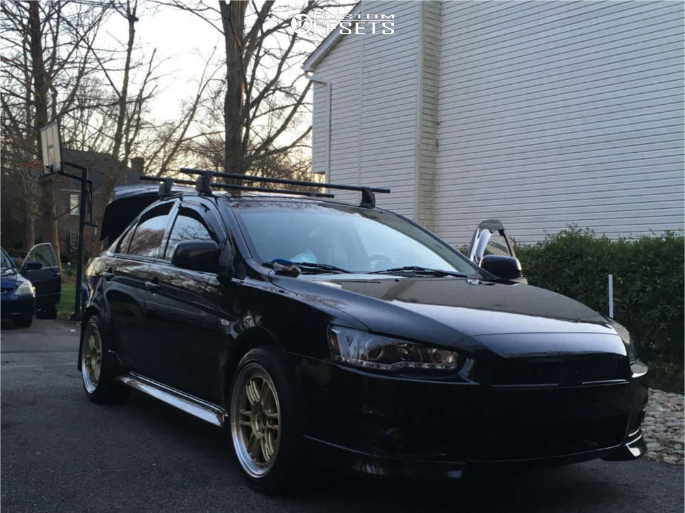 2013 Mitsubishi Lancer with 18x8.5 35 XXR 552 and 225/45R18 Nitto Neo ...