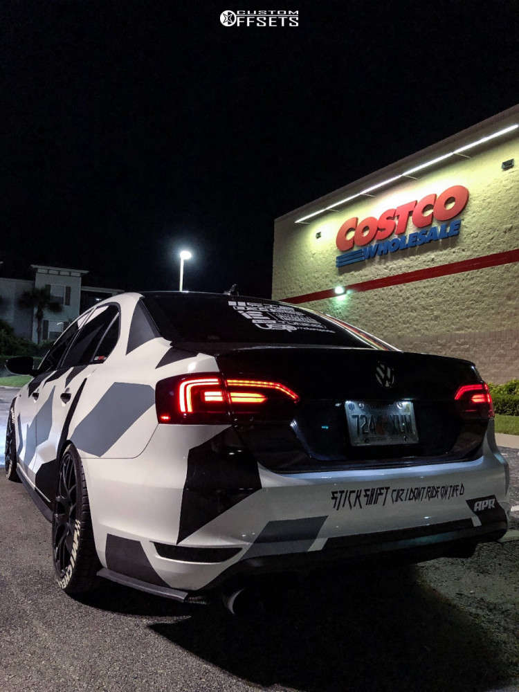 2014 Volkswagen Jetta with 18x8 35 Alzor 349 and 215/40R18 Michelin ...