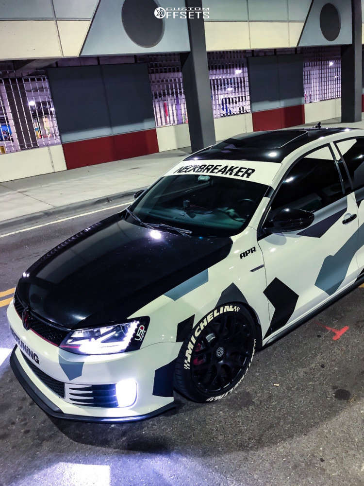 2014 Volkswagen Jetta with 18x8 35 Alzor 349 and 215/40R18 Michelin ...