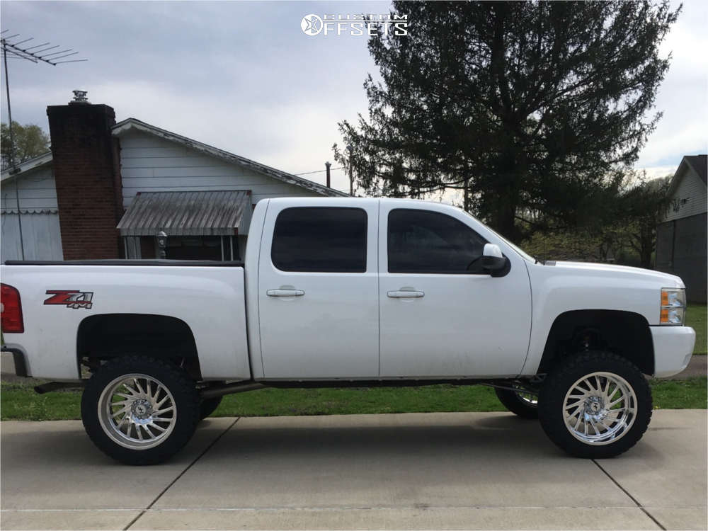 2010 Chevrolet Silverado 1500 with 22x12 -44 Hostile Forged Chaos and 35/12.5R22 Nitto Trail ...