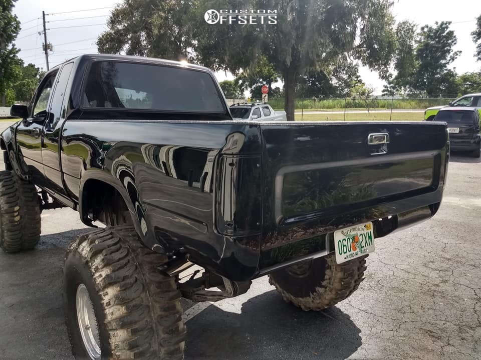 1994 Toyota Pickup with 15x10 -47 Pro Comp Series 69 and 38/15.5R15 ...