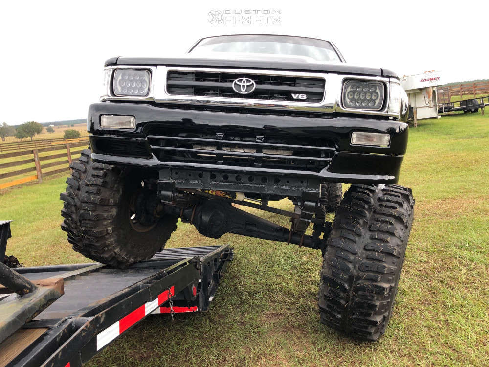 1994 Toyota Pickup with 15x10 -47 Pro Comp Series 69 and 38/15.5R15 ...