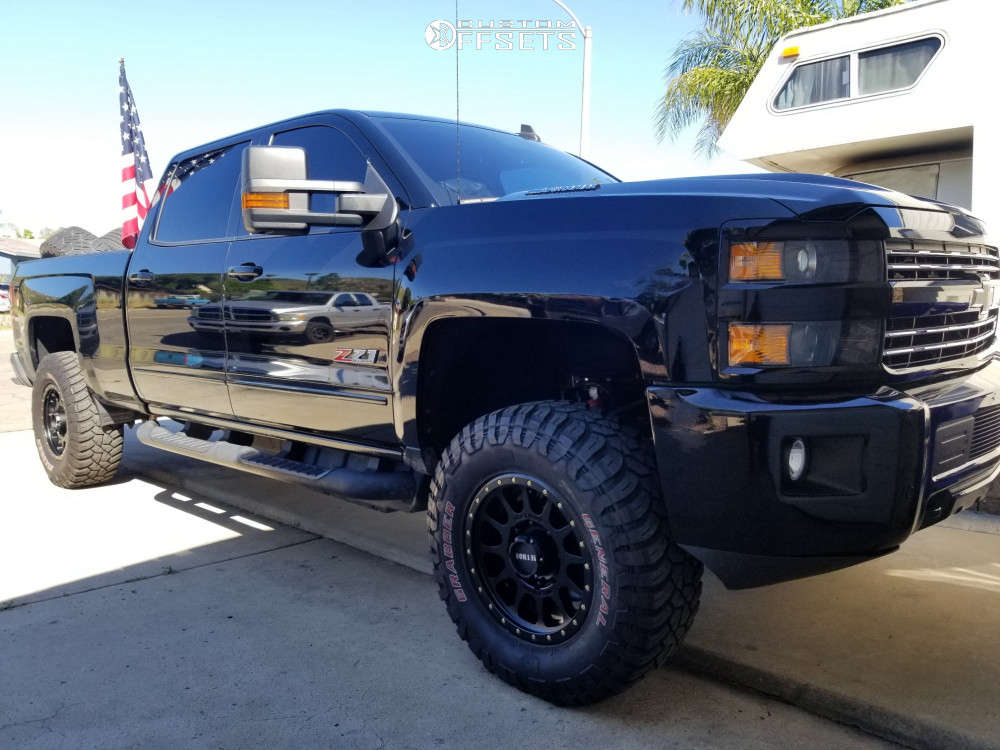 2017 Chevrolet Silverado 2500 HD with 18x9 18 Method Nv and 35/12.5R18 General Grabber X3 and ...