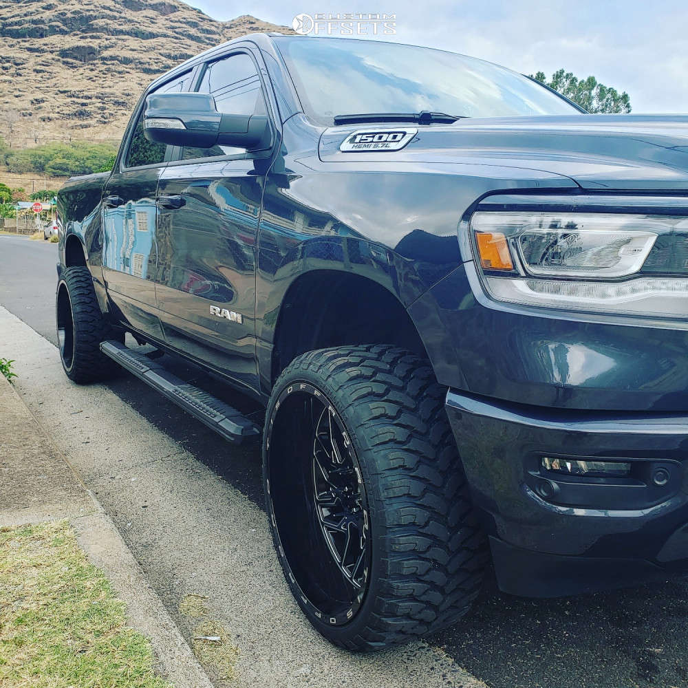 2019 Ram 1500 with 24x12 -44 TIS 544BM and 33/12.5R24 RBP Repulsor Mt ...