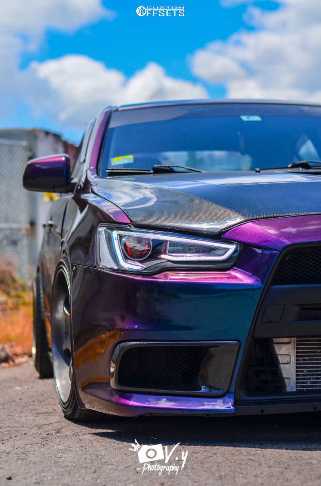 2010 Mitsubishi Lancer with 18x9.5 22 Rota Boost and 235/40R18 Michelin ...