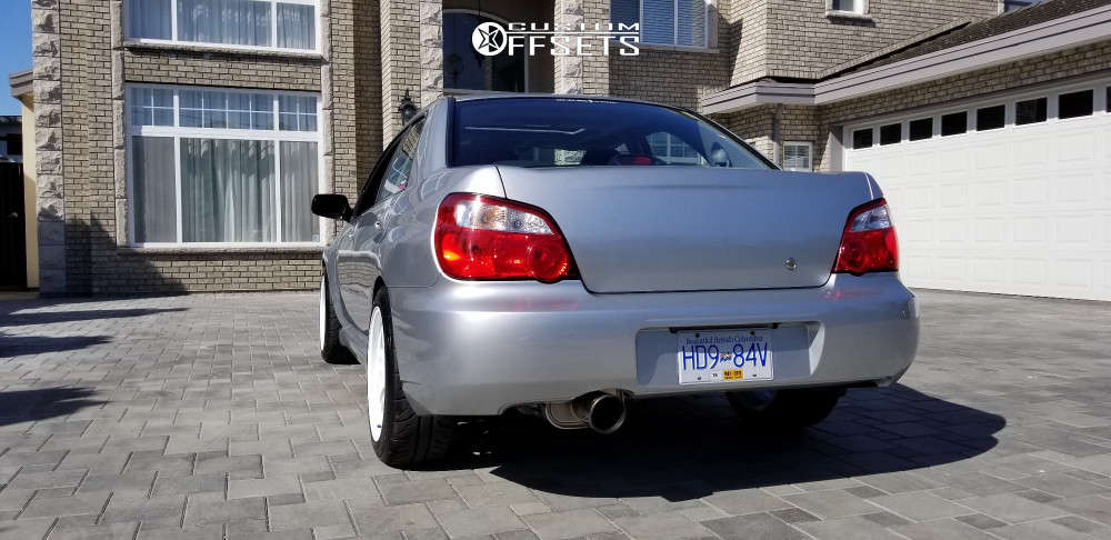 2004 Subaru Impreza with 17x9 35 Enkei RPF1 and 235/45R17 Bridgestone Potenza Re-71r and ...