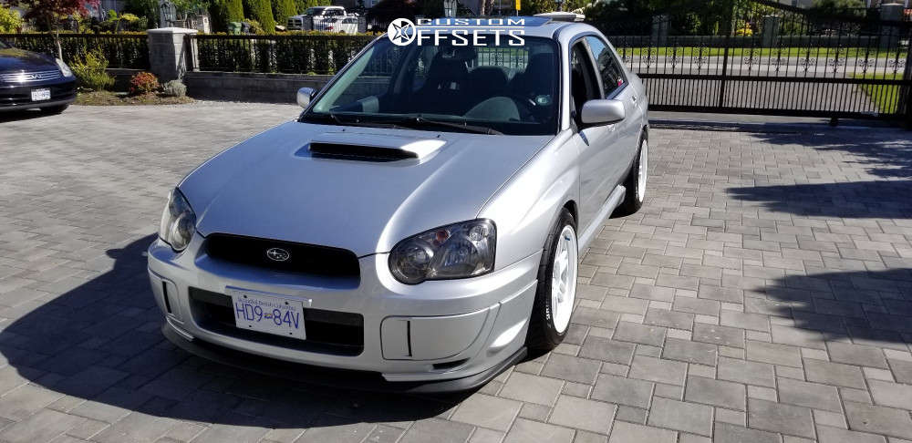 2004 Subaru Impreza with 17x9 35 Enkei RPF1 and 235/45R17 Bridgestone Potenza Re-71r and ...