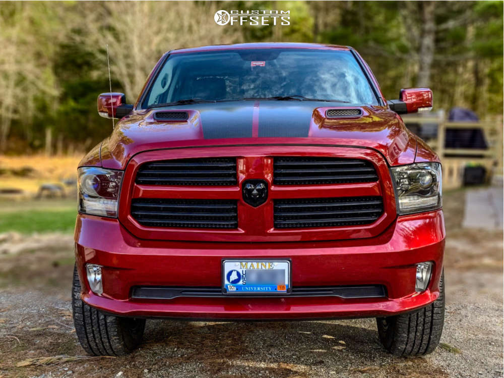 2015 Ram 1500 with 20x10 -18 XD XD137 and 33/11.5R20 Goodyear Wrangler ...