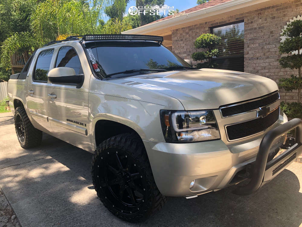 2007 Chevrolet Avalanche with 22x10 -19 Tuff T15 and 33/12.5R22 Atturo ...
