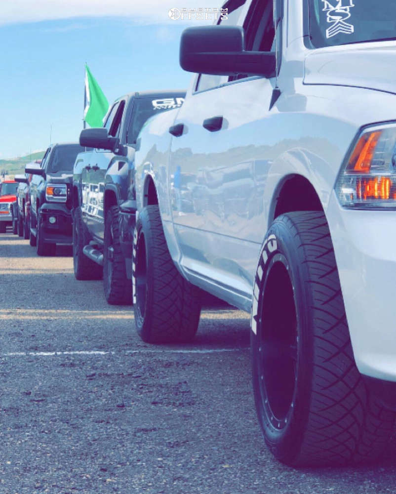 2016 Ram 1500 with 20x10 -14 Fuel Renegade and 305/50R20 Nitto NT420V and Stock | Custom Offsets