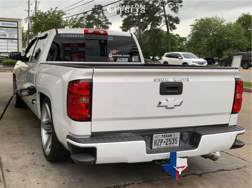 2015 Chevrolet Silverado 1500 with 24x10 31 DUB Baller and 295/35R24 ...