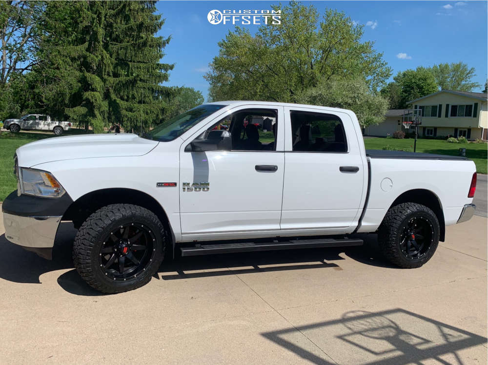 2015 Ram 1500 with 20x10 -24 Havok H112 and 275/60R20 Nitto Ridge ...