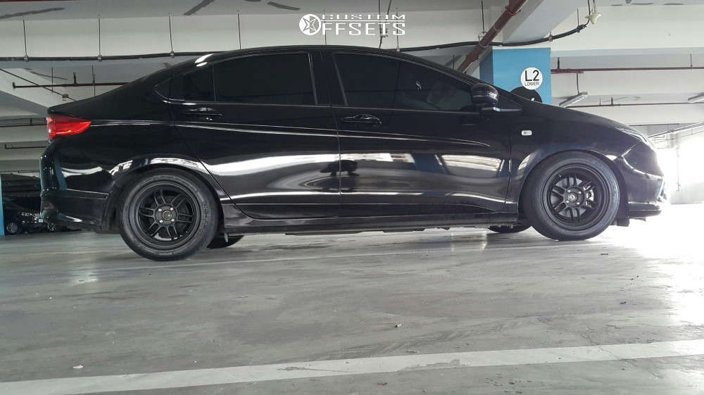 2018 Honda Fit with 15x7 38 Rota TFS301 and 195/55R15 Nankang Ns2 and ...