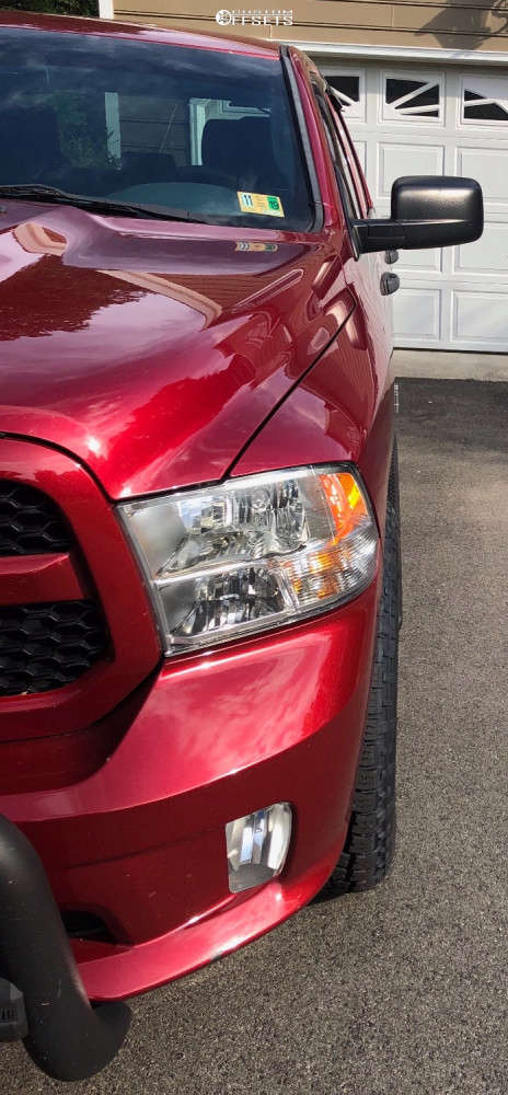 2014 Ram 1500 with 20x9 10 Vision Invader and 275/65R20 Nitto Terra ...