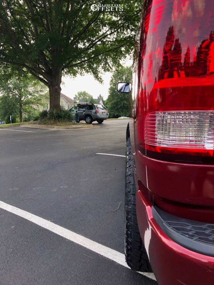 2014 Ram 1500 with 20x9 10 Vision Invader and 275/65R20 Nitto Terra ...