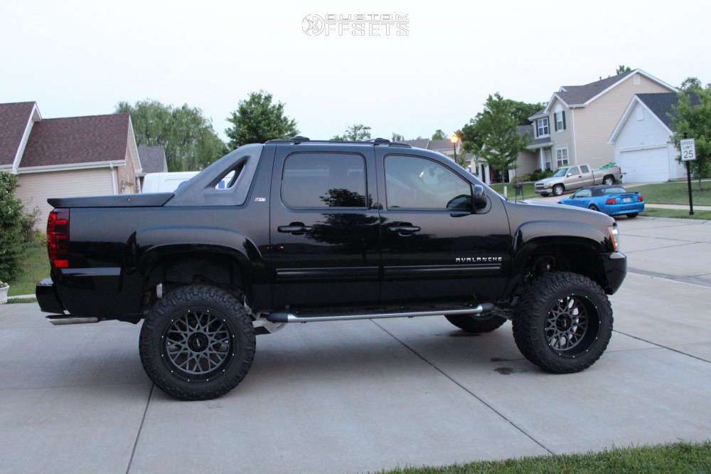 2012 Chevrolet Avalanche with 22x12 -51 Vision Rocker and 37/13.5R22 ...