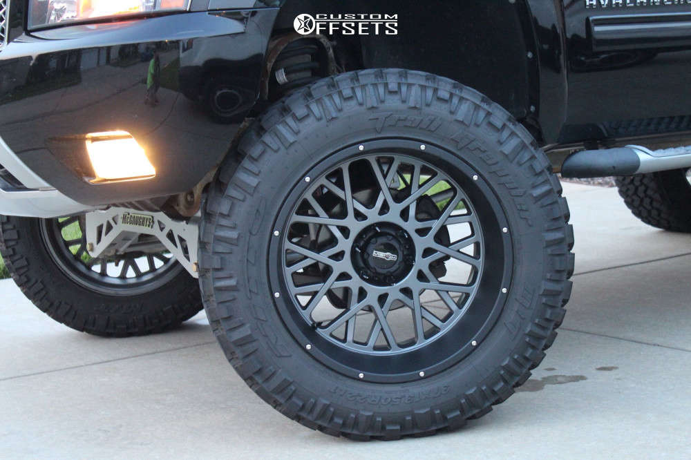 2012 Chevrolet Avalanche with 22x12 -51 Vision Rocker and 37/13.5R22 ...