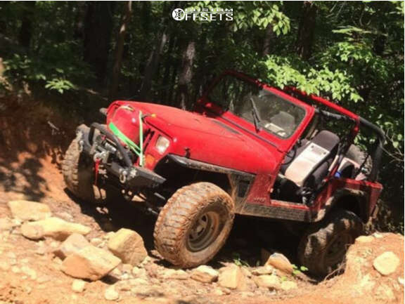 1995 Jeep Wrangler with 15x10 -12 Centerline Convo Pro and 35/12.5R15 ...