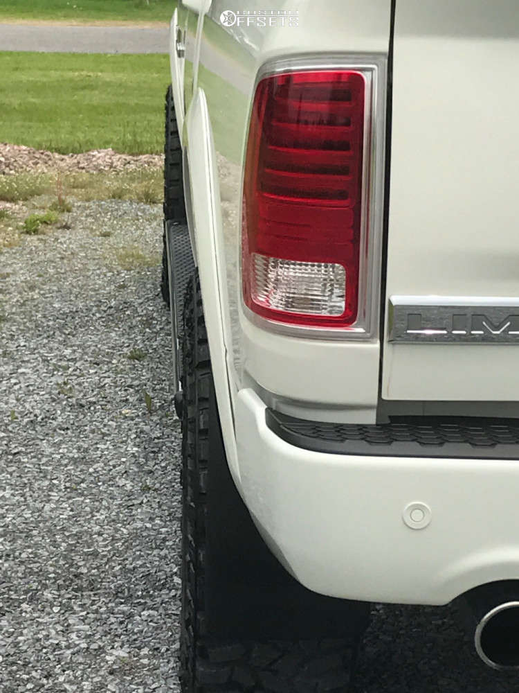 2016 Ram 1500 with 20x9 American Truxx Grind and 295/60R20 Cooper ...