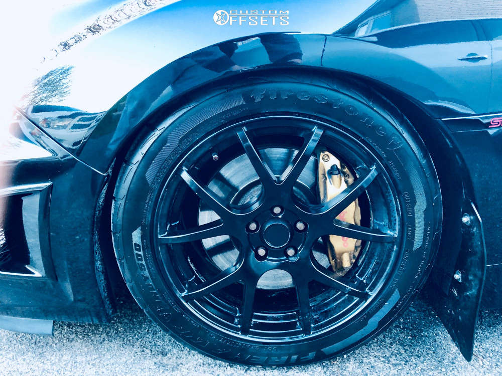 2012 Subaru WRX STI with 17x7.5 44 Enkei M52 and 245/45R17 Firestone ...