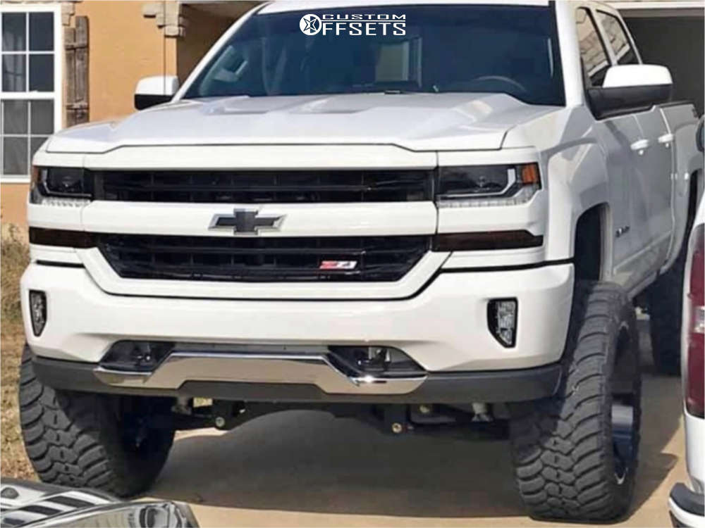 2017 Chevrolet Silverado 1500 with 22x12 -44 Hostile Sprocket and 35/13.5R22 AMP Mud Terrain ...