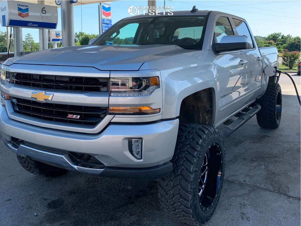 2017 Chevrolet Silverado 1500 with 22x12 -44 Hostile Sprocket and 35/12.5R22 Nitto Trail ...