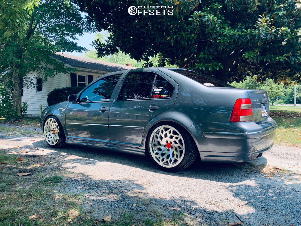 2004 Volkswagen Jetta with 18x8.5 35 WatercooledIND Md1 and 215/30R18 ...